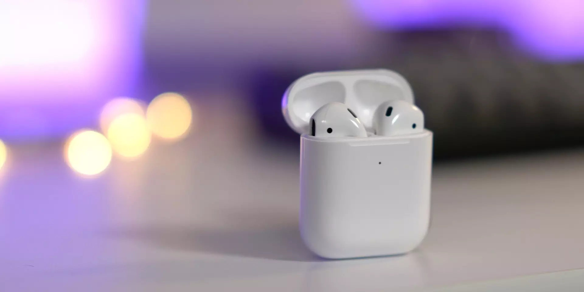 AirPods дар дохили Қуттии пуркунандаи бесим